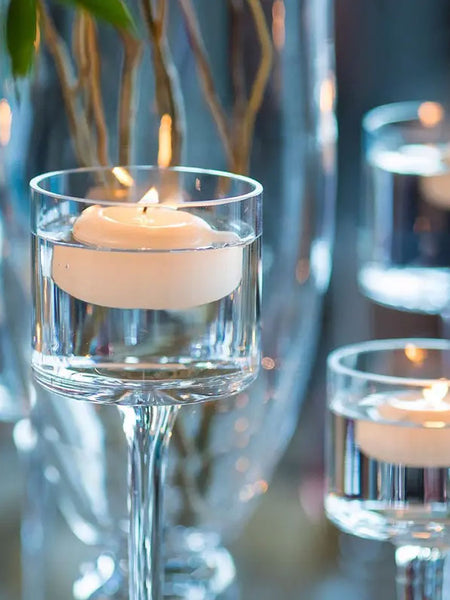 18 Floating Candles and 18 Monet Stem Holders – Yummicandles