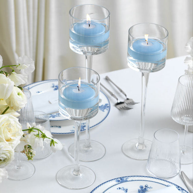 18 Floating Candles and 18 Monet Stem Holders